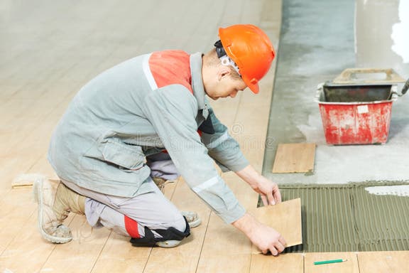Tiler at Industrial Floor Tiling Renovation Work Stock Photo - Image of ...
