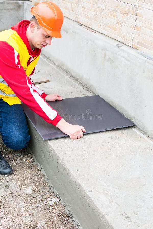Tiler Installing Ceramic Tiles Stock Image - Image of improvement ...