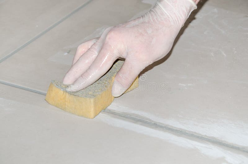 Tiler Smoothing Tile Joints Sponge Stock Photos - Free & Royalty-Free ...