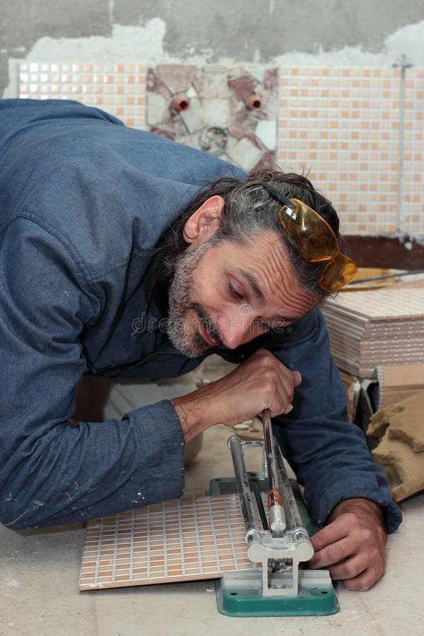 Tiler at work stock image. Image of worker, profession - 24965097
