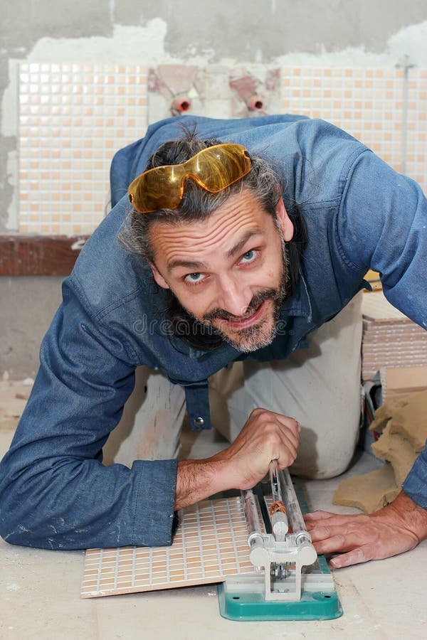 Tiler at work stock image. Image of tiler, posing, person - 36921213