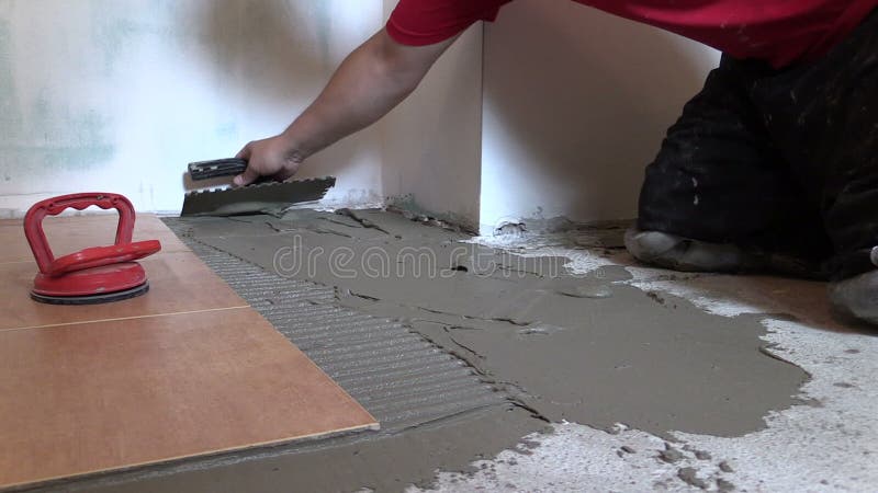 Tiler Worker Hand Spread Adhesive Material. Right Side Sliding Stock ...