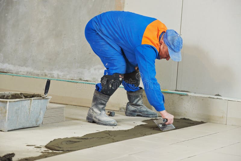 Tiler at Industrial Floor Tiling Renovation Work Stock Photo - Image of ...