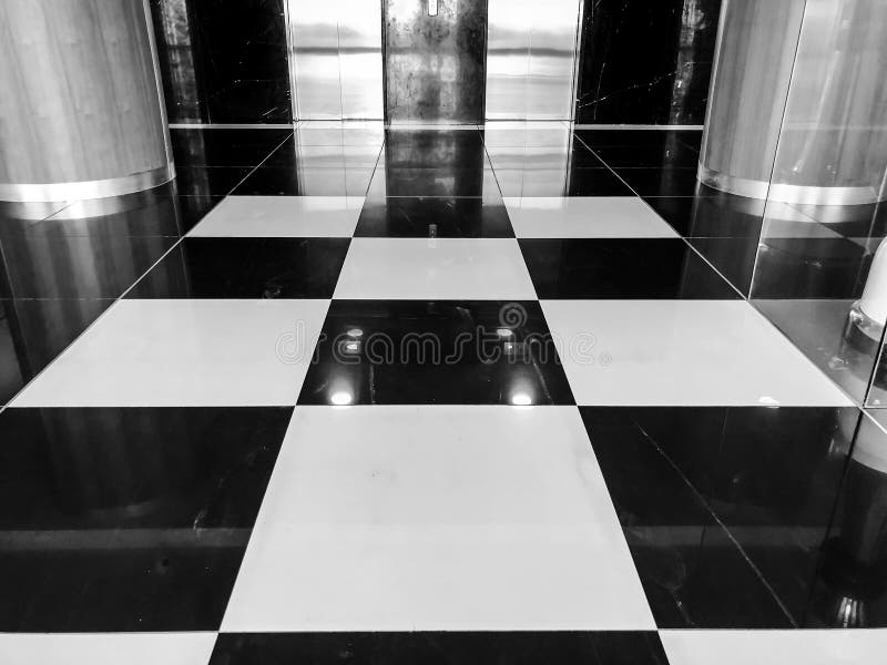 The Tiles Are A Checkered Pattern In Black And White Stock Image ...