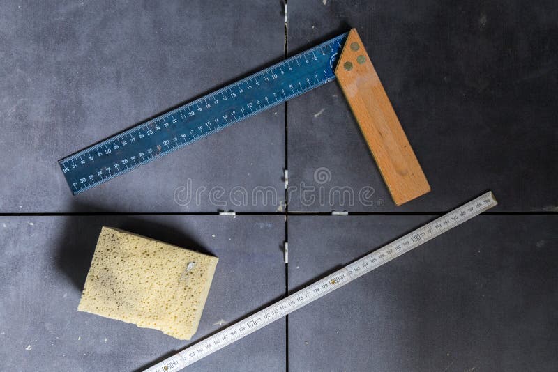 Tiles Concept Tool, Angle, Ruler, Sponge on Tiles Top View Stock Image ...