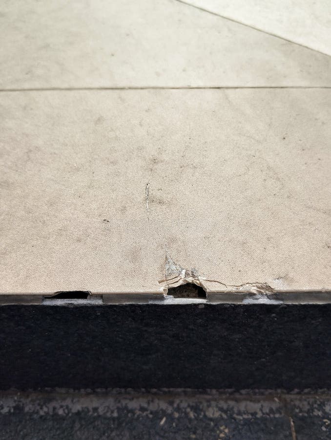 Tiles are Cracked and Broken at the Edges Stock Photo - Image of black ...