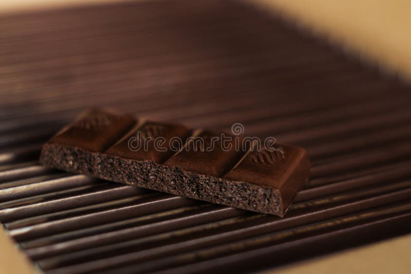 Tiles of Dark Chocolate on a Cardboard Box Packed with Chocolate Stock ...