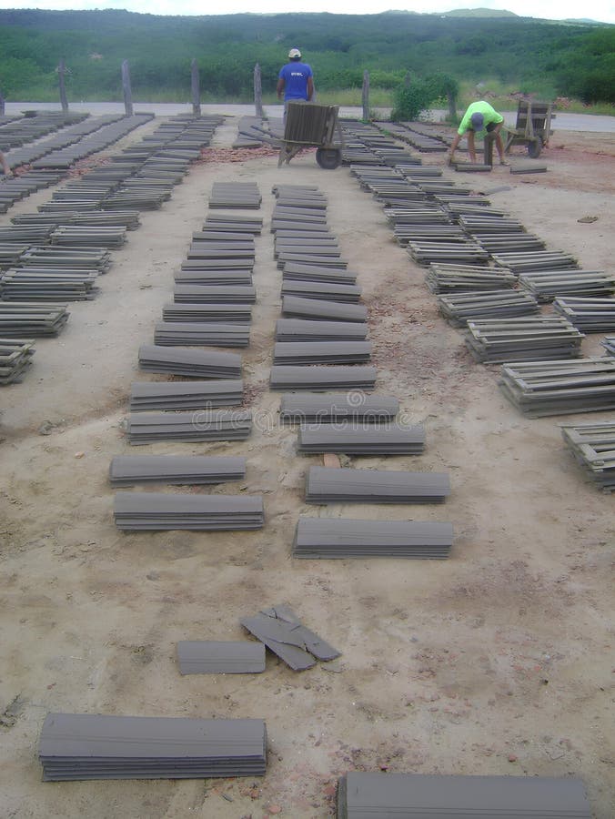 Tiles Drying on Red Ceramic Patio Stock Photo - Image of tiles, patio ...