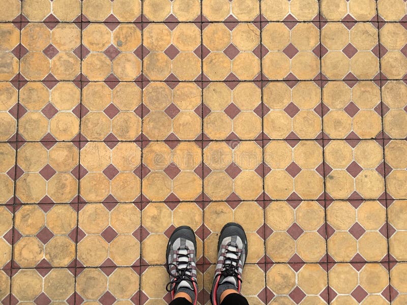 Tiles and feet stock image. Image of feet, floor, footwear - 74877323