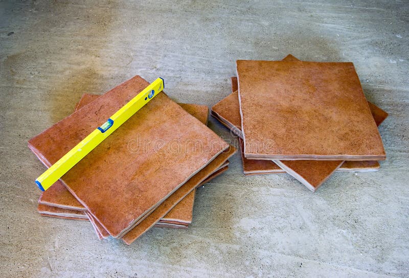 Tiles on ground stock image. Image of brown, tile, work - 9710055