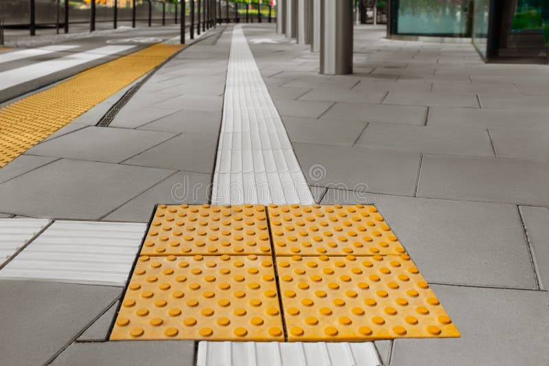 Tiles with Tactile Ground Surface Indicators, Closeup View Stock Photo ...