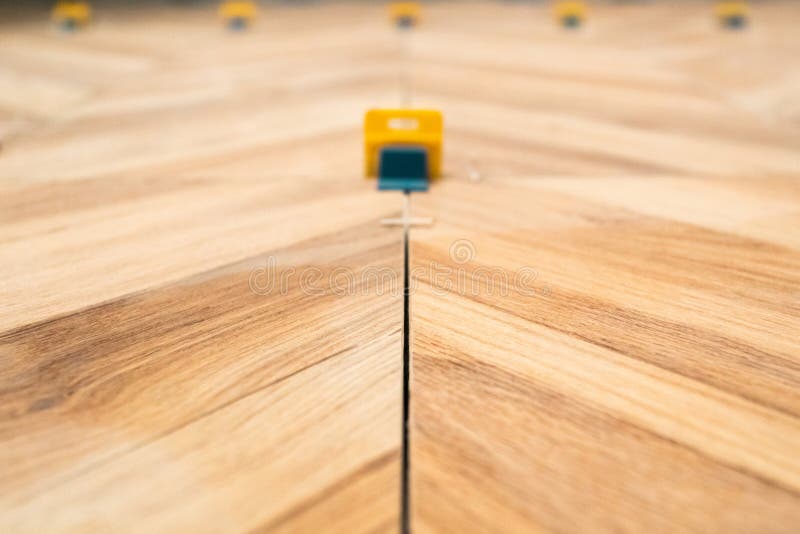 Tiling Work. Focus on the Tile Seam Stock Photo - Image of tiles ...