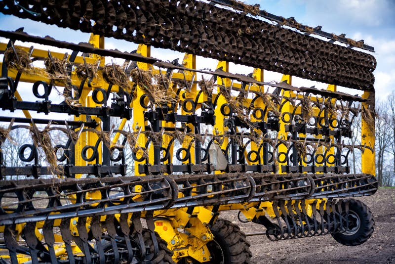Tillage in the Field with a Tractor with a Trailed Machine Stock Image ...