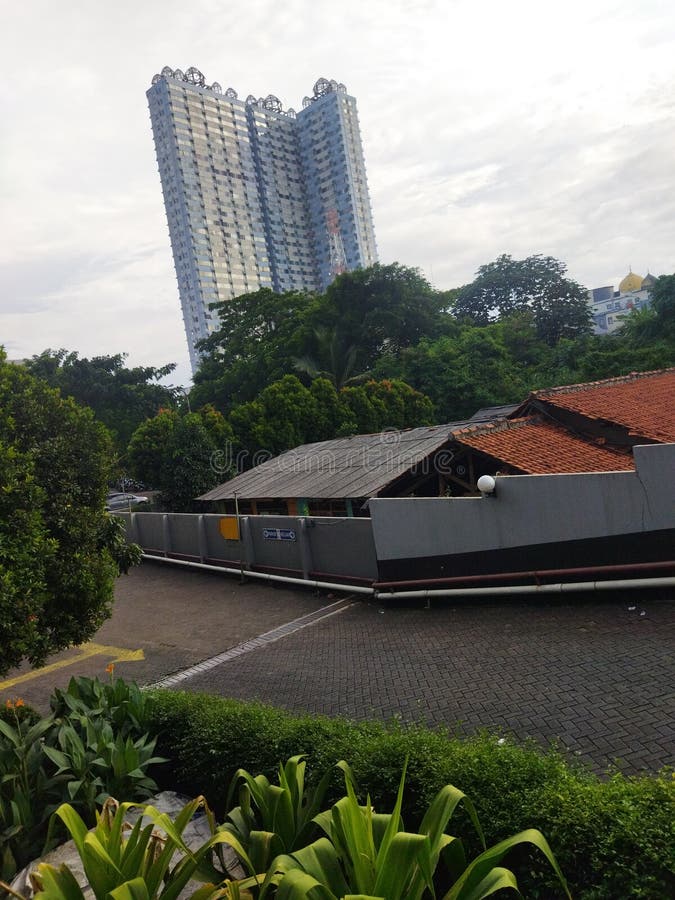 Tilted apartment building stock photo. Image of building - 267200450