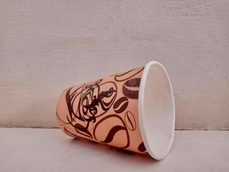 Tilted Coffee Cup Lying on the Floor Stock Photo - Image of brown ...