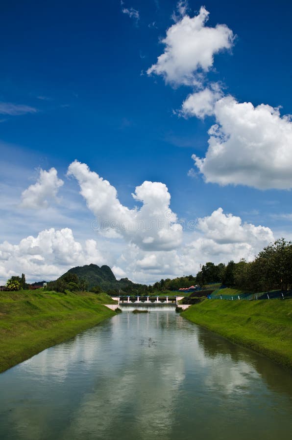 Timah Tasoh Dam stock image. Image of spillway, clouds - 23033637