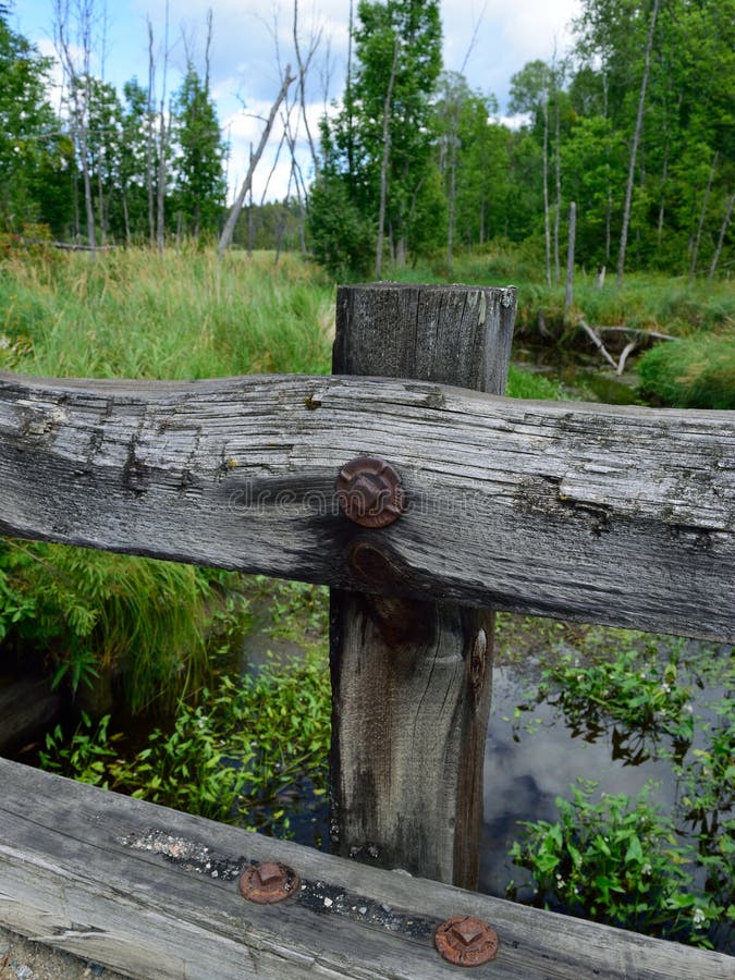 Timber Bridge over Stream stock image. Image of weathered - 59195055