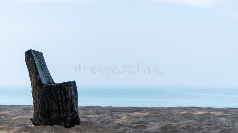 A Timber Chair Stump on the Sand Beach by the Sea Stock Image - Image ...