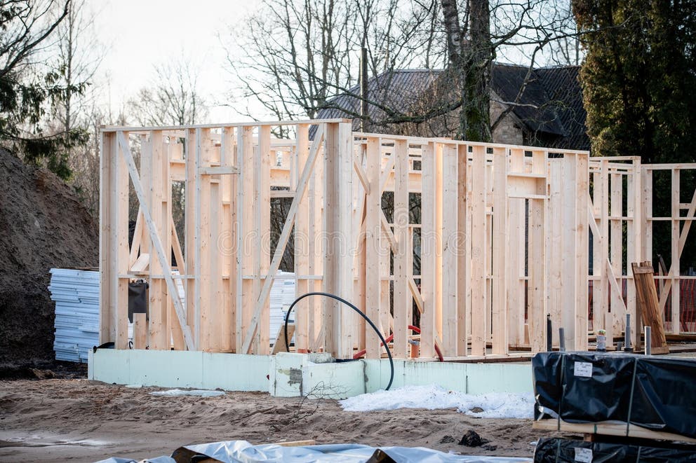 Timber Frame Building. Building Structures on a Construction Site Stock ...