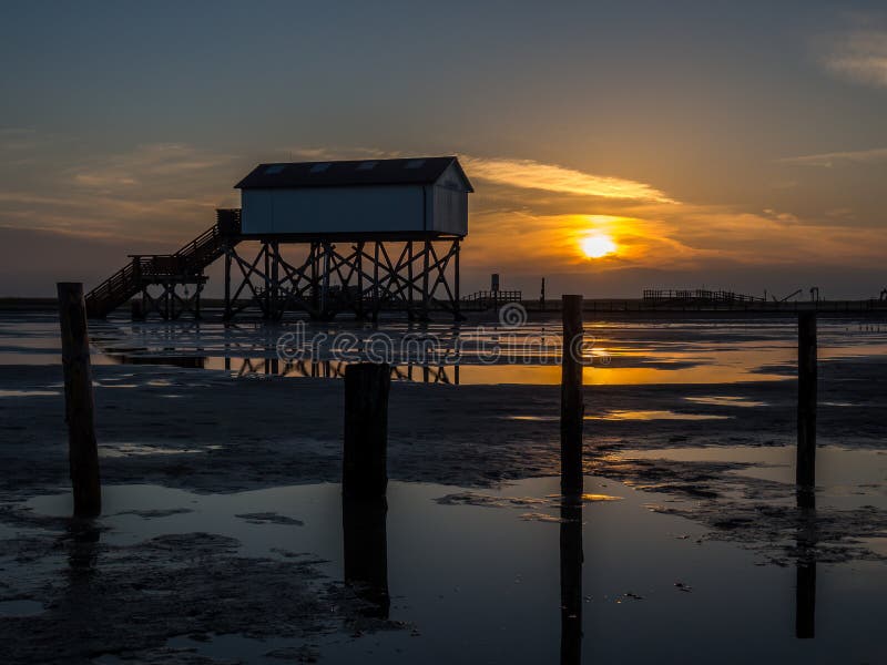 Timber house at the beach stock photo. Image of pier - 194640652
