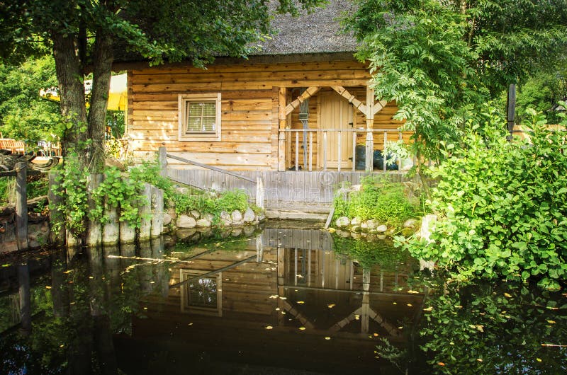 Timber House and Garden Pond Stock Photo - Image of vegetation, nature ...