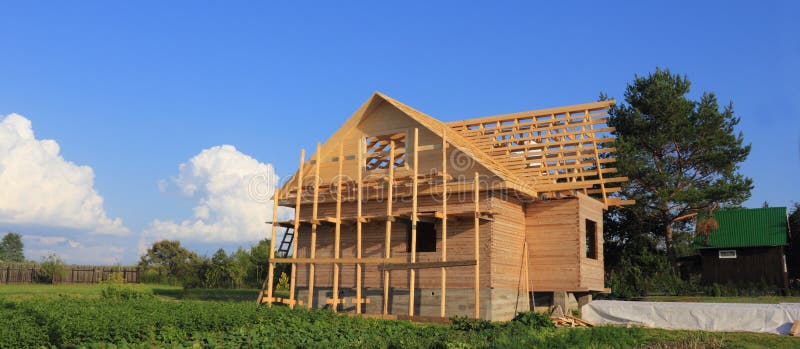 Timber House Under Constructoin with Roof Frame Stock Photo - Image of ...
