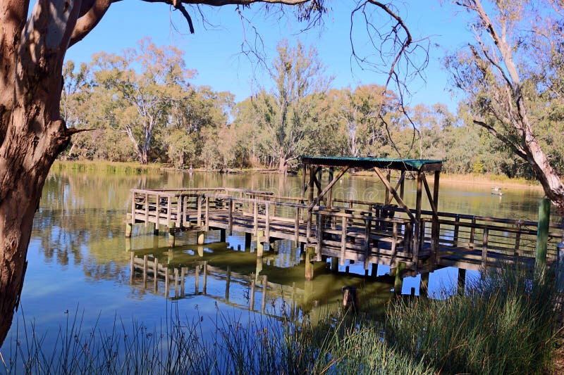 A Small Timber Jetty with Shade Structure Installed in Wetlands. Stock ...