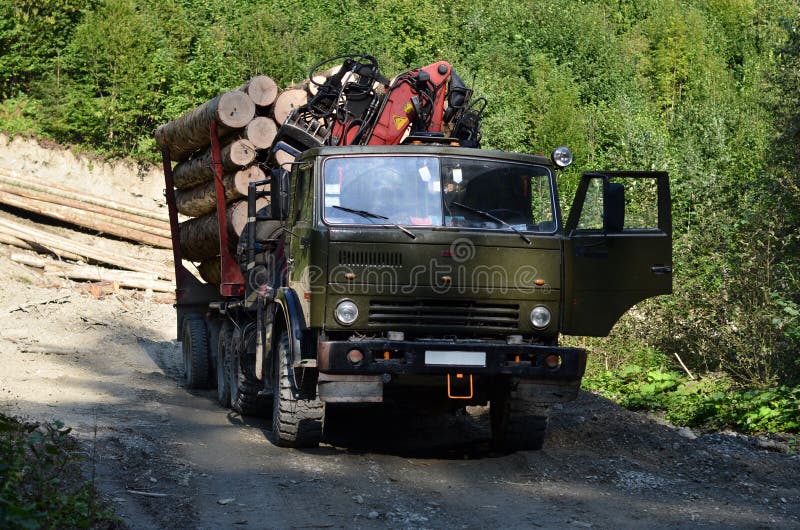 Timber Truck with Loader Lumber Stock Image - Image of hauling, lift ...