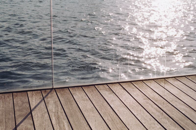Timber Wood Decking at Waterfront Stock Image - Image of banister ...