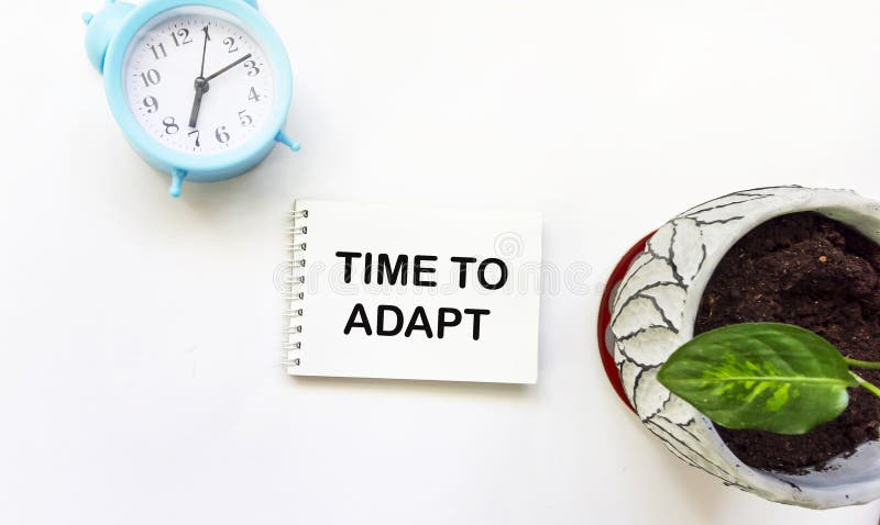 The Time for Adaptation is Written on a Notepad on a White Background ...