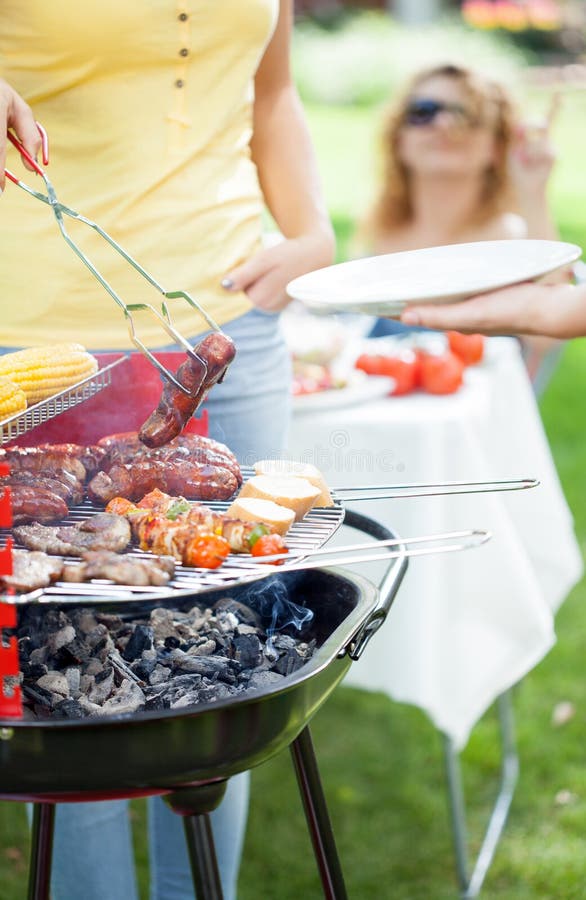 Time for Barbecue in a Garden Stock Image - Image of family, grilled ...