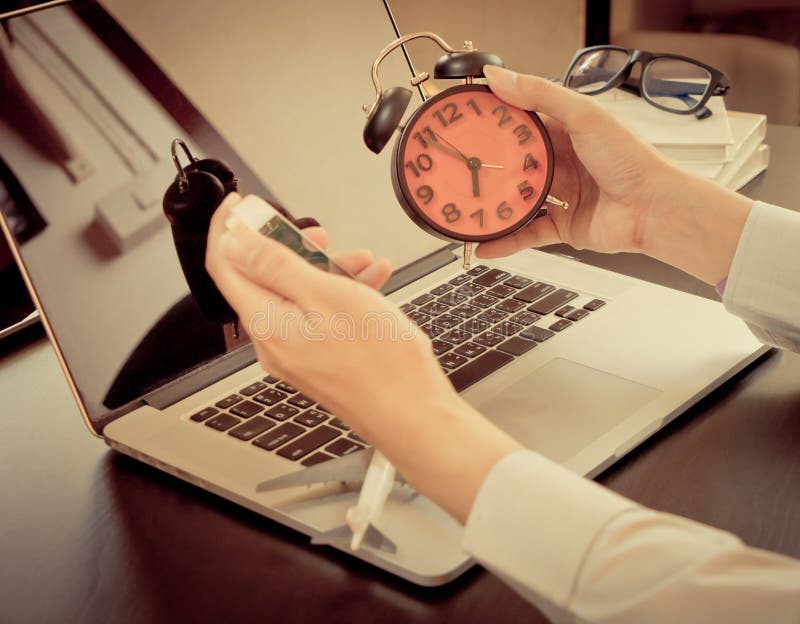Time for Business Travel. Office Worker Looking at a Clock Ready To ...