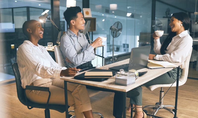 Time for a Coffee Break. a Group of Businesspeople Working Late in a ...
