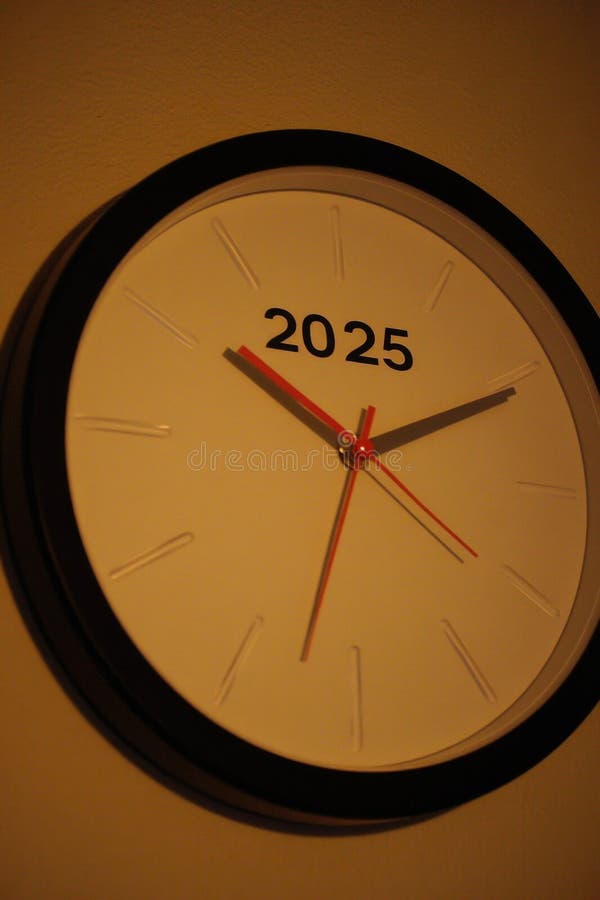 Time Conceptualization: Wall Clock Displaying Future Year 2025 at Night ...