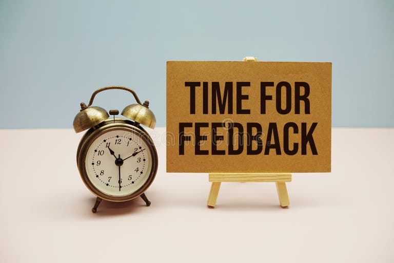 Time for Feedback Text with Easel and Alarm Clock on Blue and Pink ...
