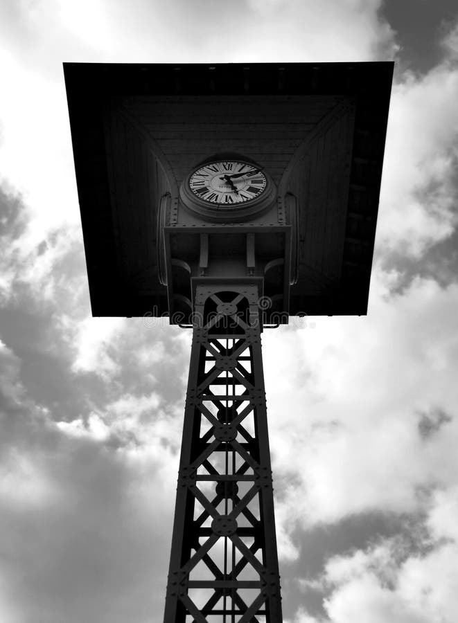 A Huge Clock Reaching the Sky and the Clouds Stock Image - Image of ...