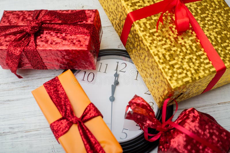 Time for Gifts. Colorful Gifts and a Clock Showing Twelve Stock Photo ...