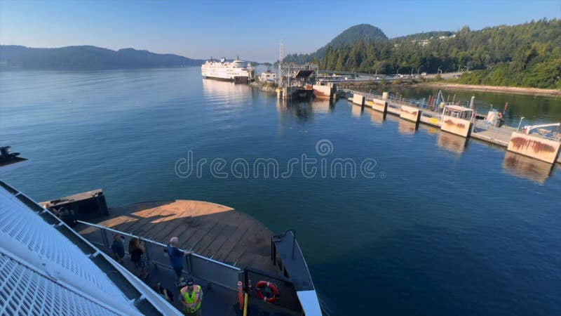 Time-lapse of a Boat with Passengers Arriving at the Pier in Langdale ...