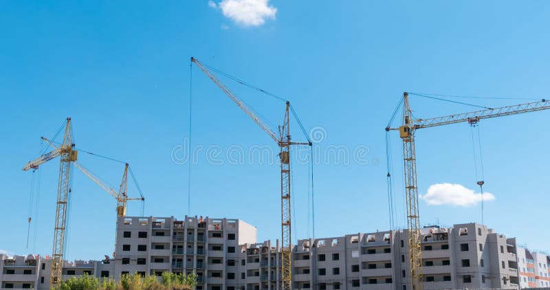 Time Lapse of Building Under Construction, Crane and Beautiful Clouds ...