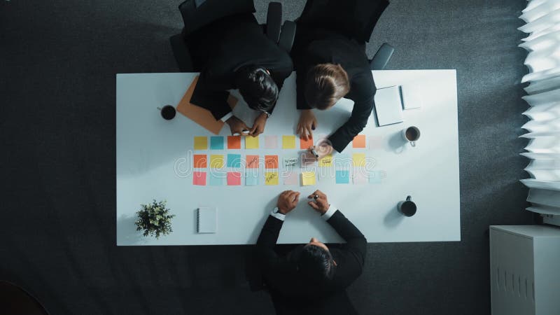 Top View of Smart Team Making Kanban while Writing at Task Board ...