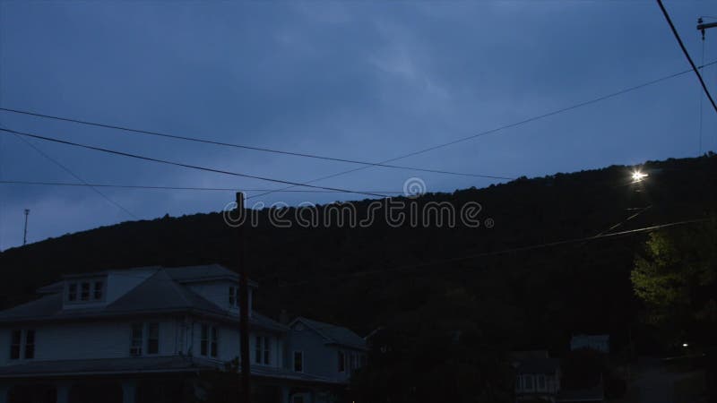 Time-lapse of the Clouds Moving in the Sky Over the Forested Mountains ...