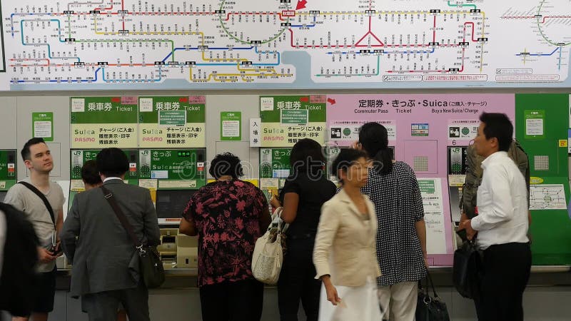 Time Lapse of Commuters Using Ticket Machine at Busy Tokyo Metrorail ...