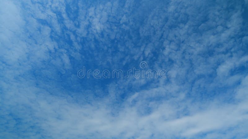 Floating Fluffy Clouds. Two Layers of Cloudiness. Blue Summer Sky with ...