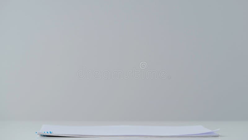 Time Lapse of Paper Sheets on White Background. Stop Motion Animation ...