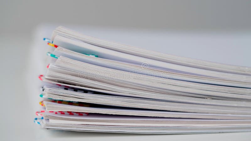 Time Lapse of Paper Sheets on White Background. Stop Motion of Business ...