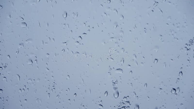 Time Lapse of Rain Drops Running Down a Window in a Close Up View Stock ...