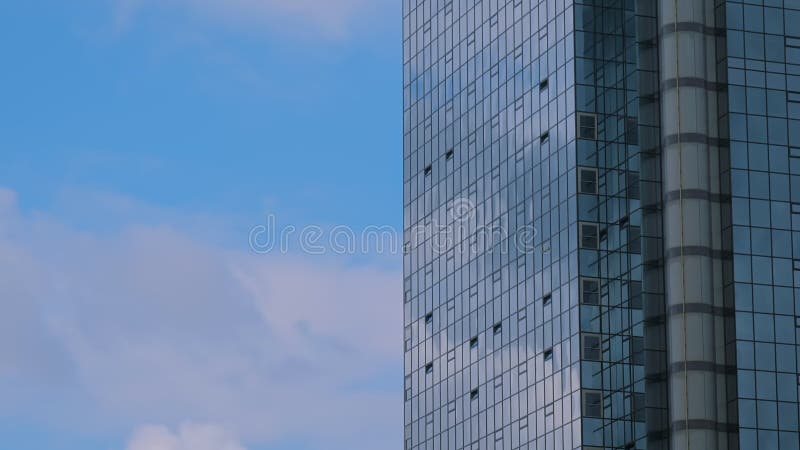 Time Lapse: Reflection of Moving White Clouds on the Glass Wall of ...