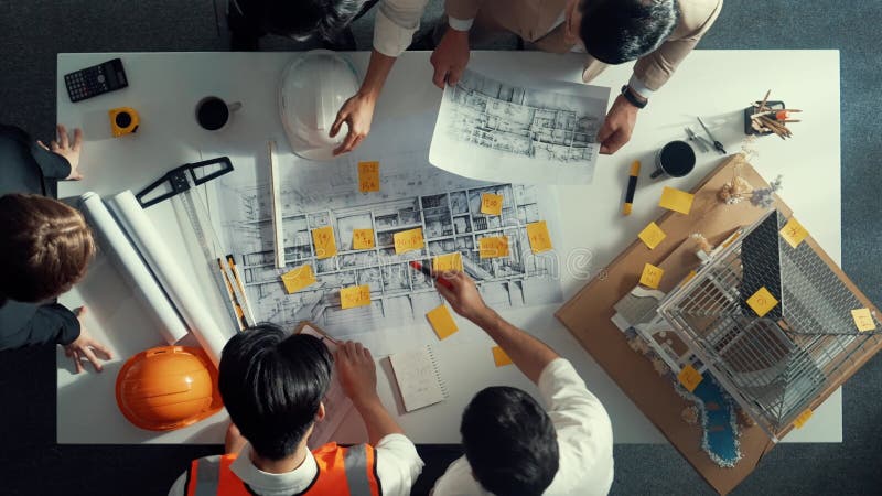 Time Lapse of Engineer Write Idea on Note and Stick on Blueprint ...