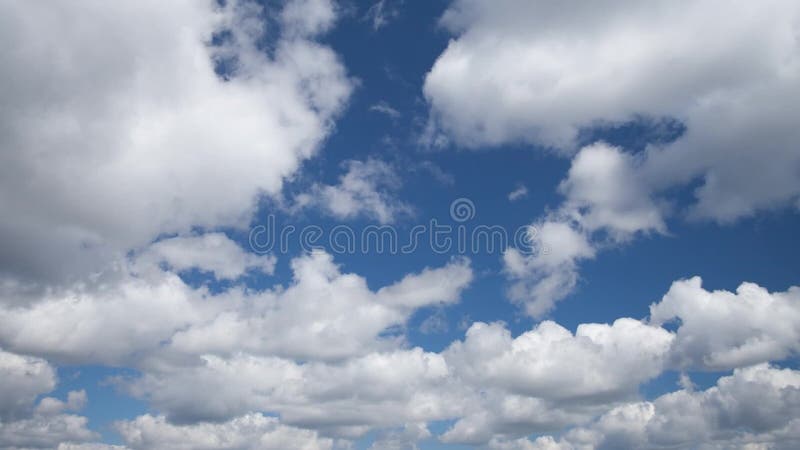 White Fluffy Clouds Moving on Deep Blue Sky Background Texture Stock ...