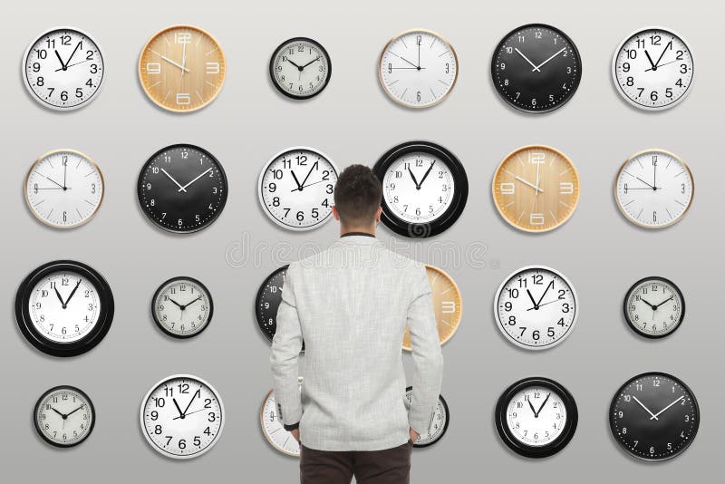 Time Management Concept. Businessman Standing in Front of Different ...